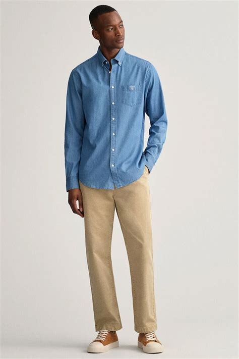 Mens Khaki Pants Blue Oxford Shirt And Brown Canvas Sneakers Outfit