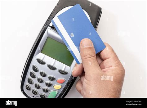 Hand Make Payment With Credit Card With Nfc Contactless Technology On