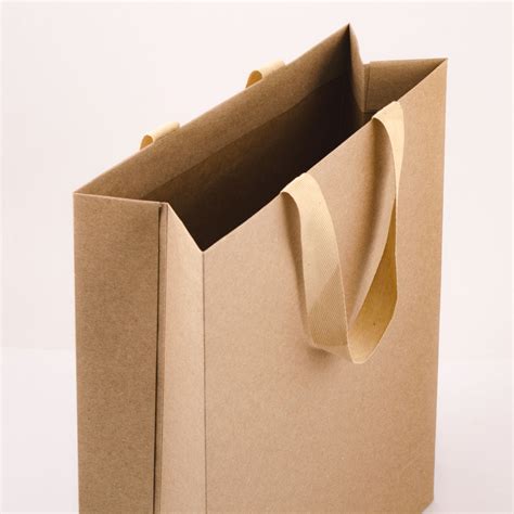 Паперові бурі крафт пакети з ручками — Готові крафтові пакети купити у Києві ціна фотографії