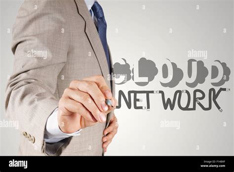 Businessman Hand Drawing Cloud Network Desogn Word And Diagram On The Businessman Hand Drawing Cloud Network Desogn Word And Diagram On The
