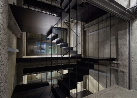 Continuous Staircase Connects Levels Of Florian Buschs K8 Bar