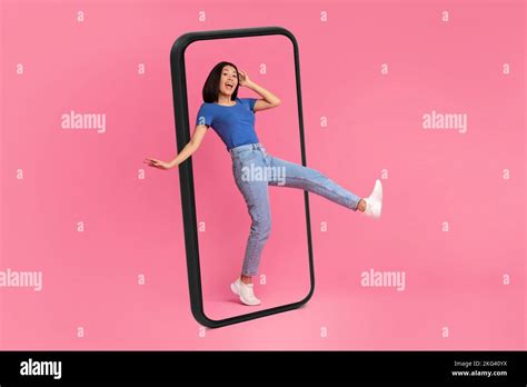 Cheerful Excited Surprised Millennial Japanese Woman With Open Mouth Enjoy Freedom On Huge