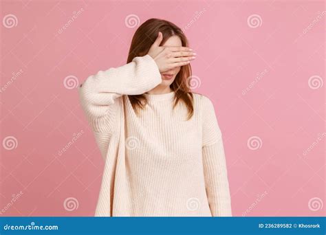 Ashamed Confused Woman With Blond Curly Hair Hiding Closing Eyes With Hand Shocked Puzzled Don
