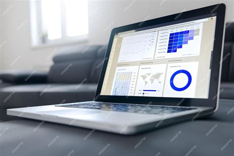 Modern Laptop Displaying Data Analytics And Visualizations In A Cozy Workspace Premium Ai