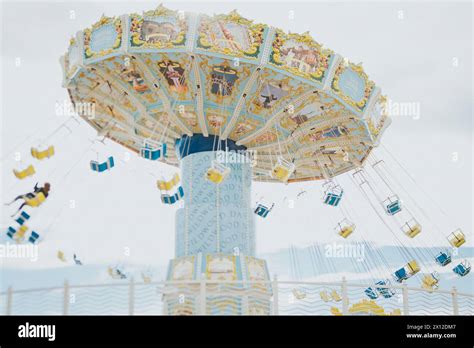 Woman Riding The Chair Swing Ride Alone At Wildwood Stock Photo Alamy