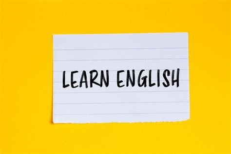 Premium Photo Learn English Message Written On Ripped White Paper