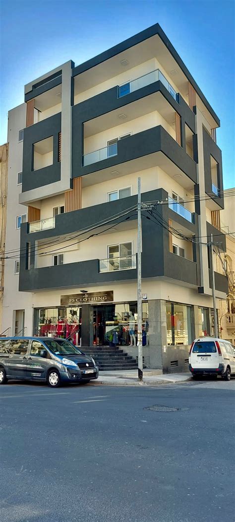 Wpc Facade Cladding For Mbi Construction Tabone Projects