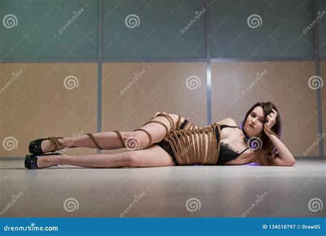 Woman Bound With A Rope In Japanese Technique Shibari Stock Image Image Of Desire Hand 134510797