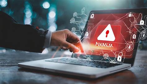 Concept Of Cyber Crime And Cyber Security Hand Using Laptop And Show Malware Screen With