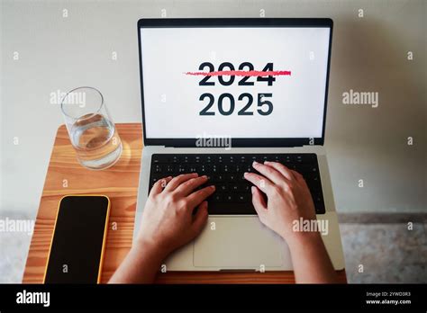 New Year 2024 To 2025 Transition Display In Computer Laptop Stock