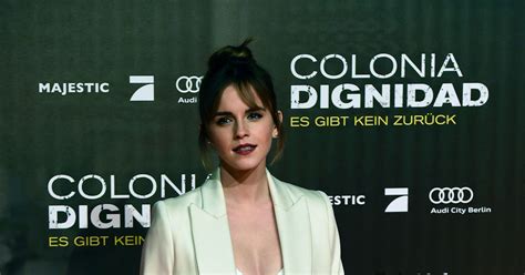 Emma Watsons Bangs Are Putting A New Spin On The Top Knot — Photos