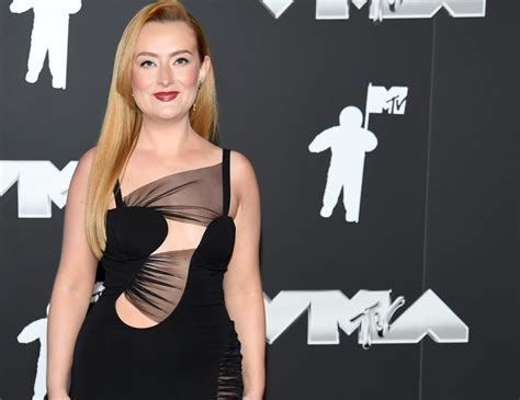 Amelia Dimzs Black Latex Leg Slit Gown Is Her Best Look Ever