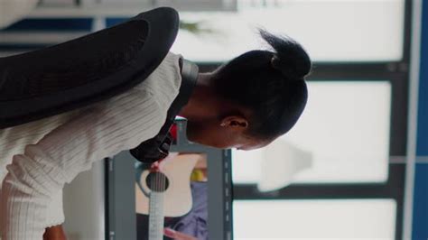 African Video Editor Looking At Camera Smiling Editing Video Project Technology Stock Footage