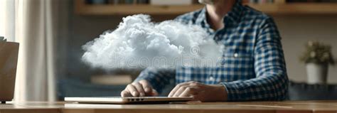 Man Working On Laptop With Cloud Above Concept Of Cloud Computing And