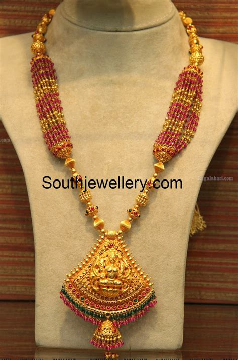 Ruby Beads Necklace With Lakshmi Pendant Indian Jewellery Designs