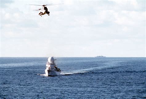 An Sh 3 Sea King Helicopter Flies Over The Dutch Frigate Hrms Tromp F