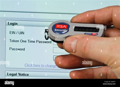 Man Uses Securid Token To Log Into A Website Needing A Userid Passcode