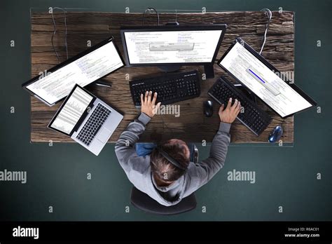 Hacker Stealing Data From Multiple Computer Stock Photo Alamy