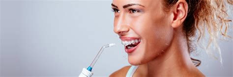 The Benefits Of Flossing With Water Instead Of String