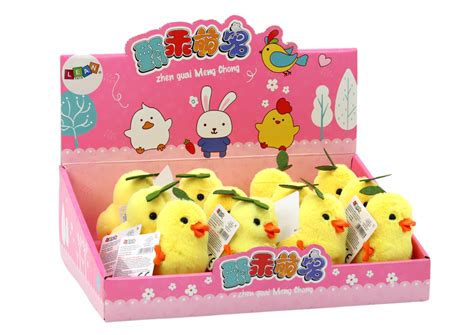 Yellow Clockwork Jumping Hen With Leaf Toys Wielkanoc