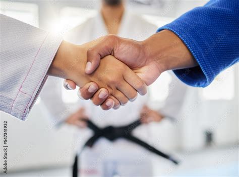 Handshake Karate And Sports With A Man And Woman Fighter Shaking Hands In A Gym Club Or Dojo