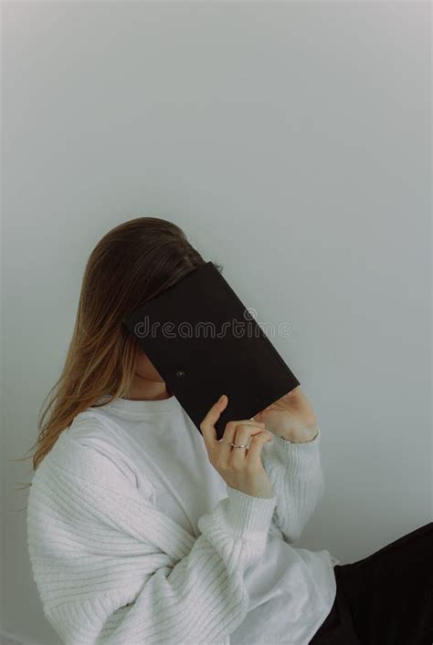 Young Beautiful Blonde Woman With A Sign Yes And No Choice And The Choice Yes Or No Stock Image