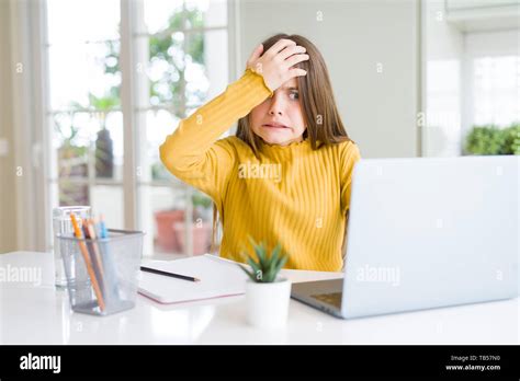 Beautiful Young Girl Studying For School Using Computer Laptop Stressed