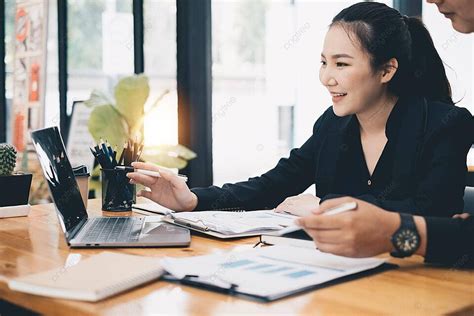 Team Of Businesswomen And Accountants Conducting Financial Audit Emphasizing Finance And