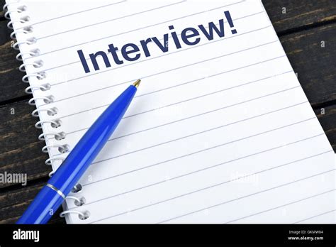 Interview Text On Notepad And Blue Pen Stock Photo Alamy
