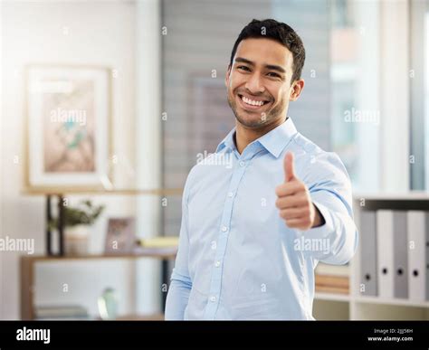 Dont Be Afraid To Reach For Your Goals A Young Businessman Giving The