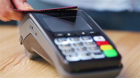 Nfc Credit Card Payment Woman Paying With Contactless Credit Card With Nfc Technology Wireless