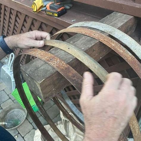 Diy Garden Orbs Repurposing Wine Barrel Rings For A Stunning Outdoor