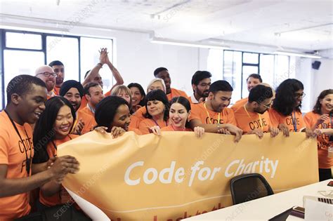 hackers with banner coding at hackathon stock image f022 2999