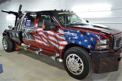 American Flag Tow Truck In Garage