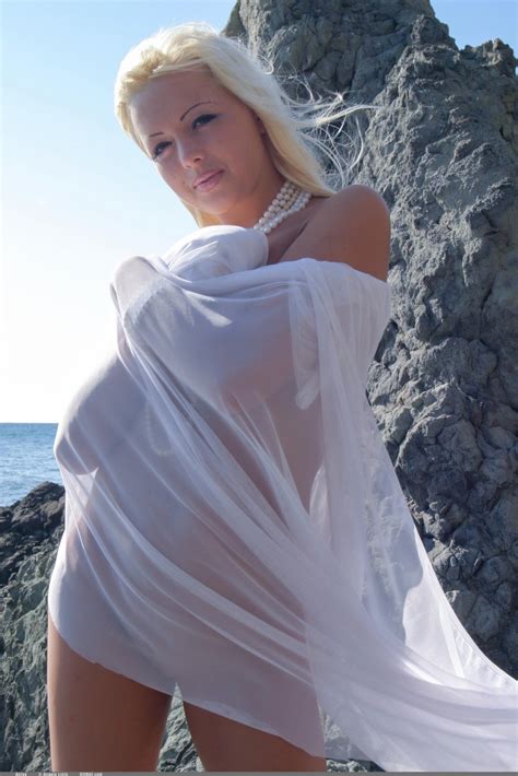 Anjye Blonde Vixen Anjye Seductively Poses Naked On The Rocks By The Sea In Domai Set Anjey
