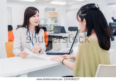 Woman Reception Desk Stock Photo 2246386217 Shutterstock
