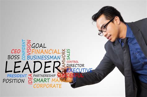 Premium Photo Asian Businessman Writing Word Of Leader