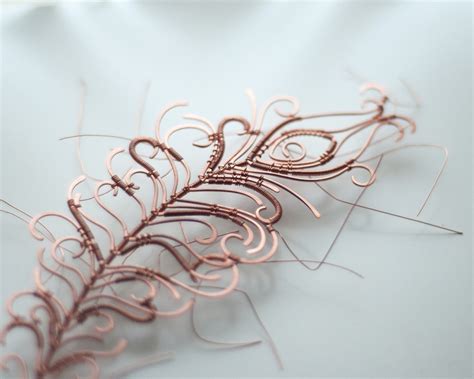 The Process Of Wire Wrapping Peacock Feather Instagram Springstring
