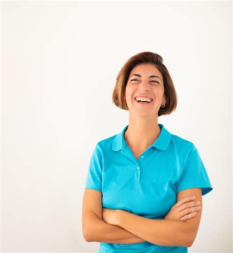 Premium Photo A Woman Owner Of Her Own Physiotherapy Clinic Smiles