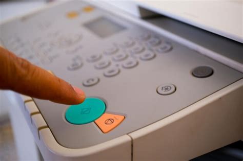 premium photo cropped hand using calculator