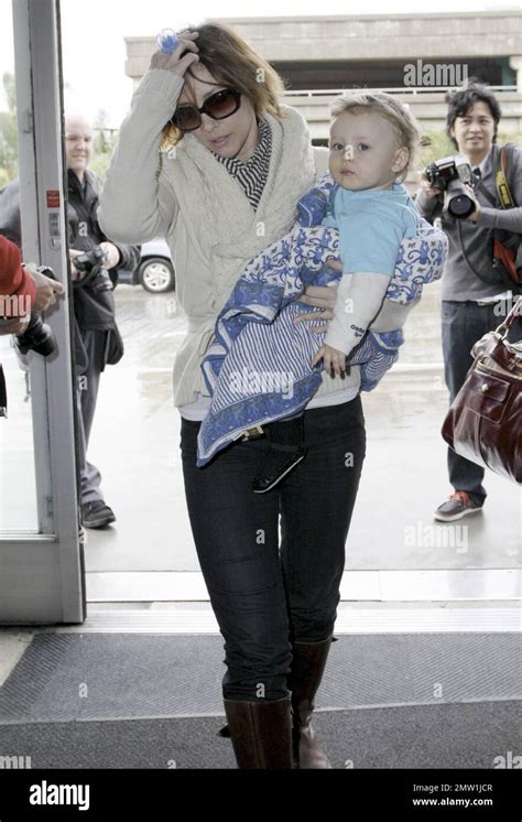 Up In The Air Star Vera Farmiga Carries Her Son Flynn As She Arrives