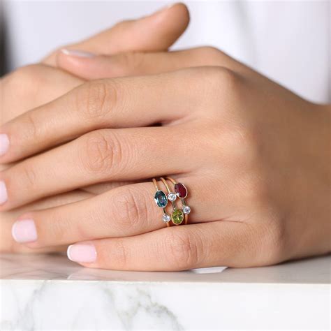14k Gold Oval Peridot And Diamond Ring Ferkos Fine Jewelry