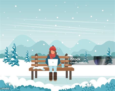 Happy Girl Sitting On A Bench In The Winter Park With Lap Top And Cup
