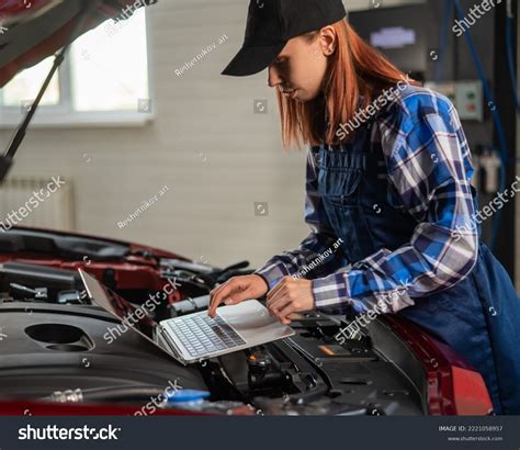 Woman Auto Mechanic Doing Engine Diagnostics Stock Photo 2221058957 Shutterstock