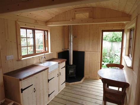 Rustic Tiny House Kitchen With Wooden Walls