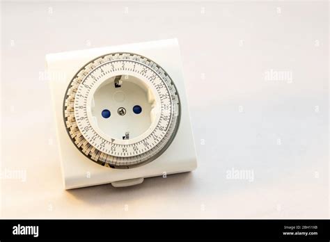Analogue Timer Switch To Set Your Light On Or Machine On A Certain Moment On A White Background