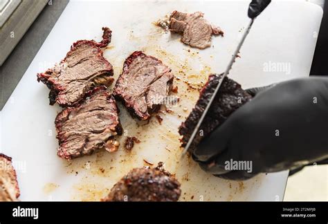 Chef Hands Slicing Beef Steak With Knife Food Preparation Process