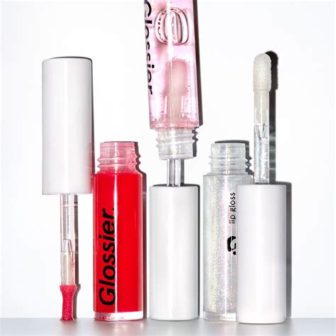 Glossier Lip Gloss in Holographic, a clear base with an opalescent ...