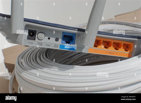 Close Up Detail Of A Modern Wi Fi Router With Multiple Inputs And Ports For Cable Connections