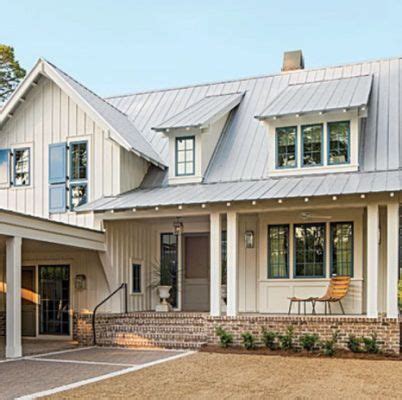 White House With Shed Dormer Board And Batten And Porch